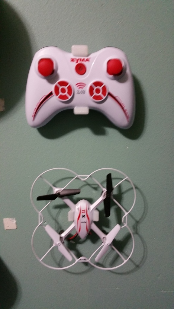 Free 3D file Syma controller wall mount 🚁 ・3D printing model to ...