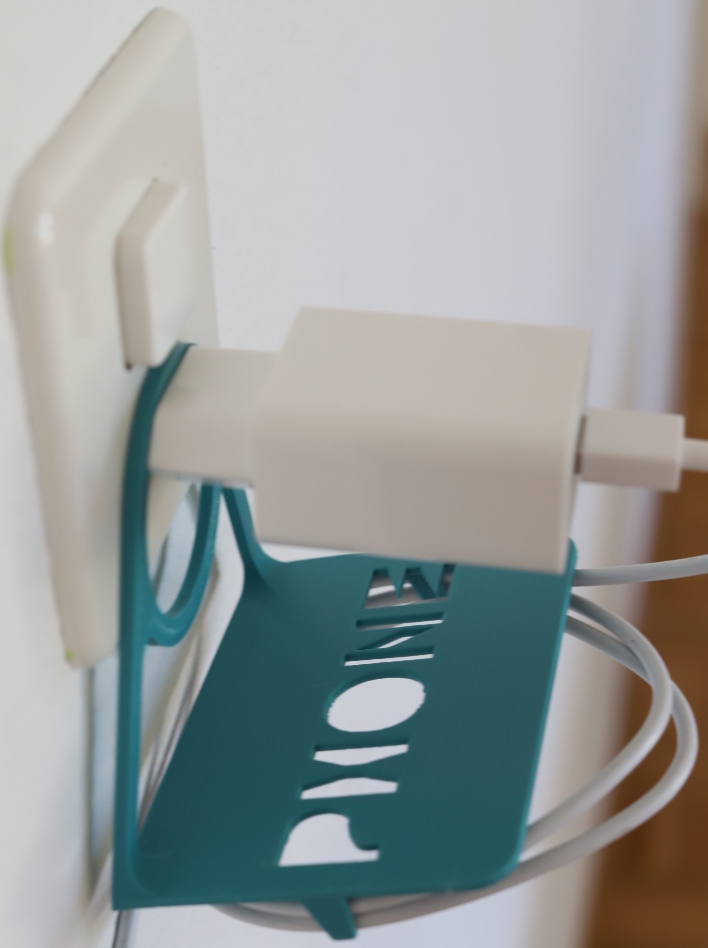 Free STL file Outlet Phone Holder with Cable Management 📞・3D printable ...