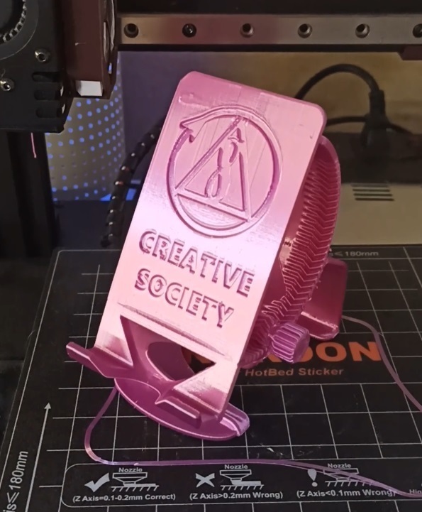 Free 3D file Creative Society Logo on Phone holder with an angle ...