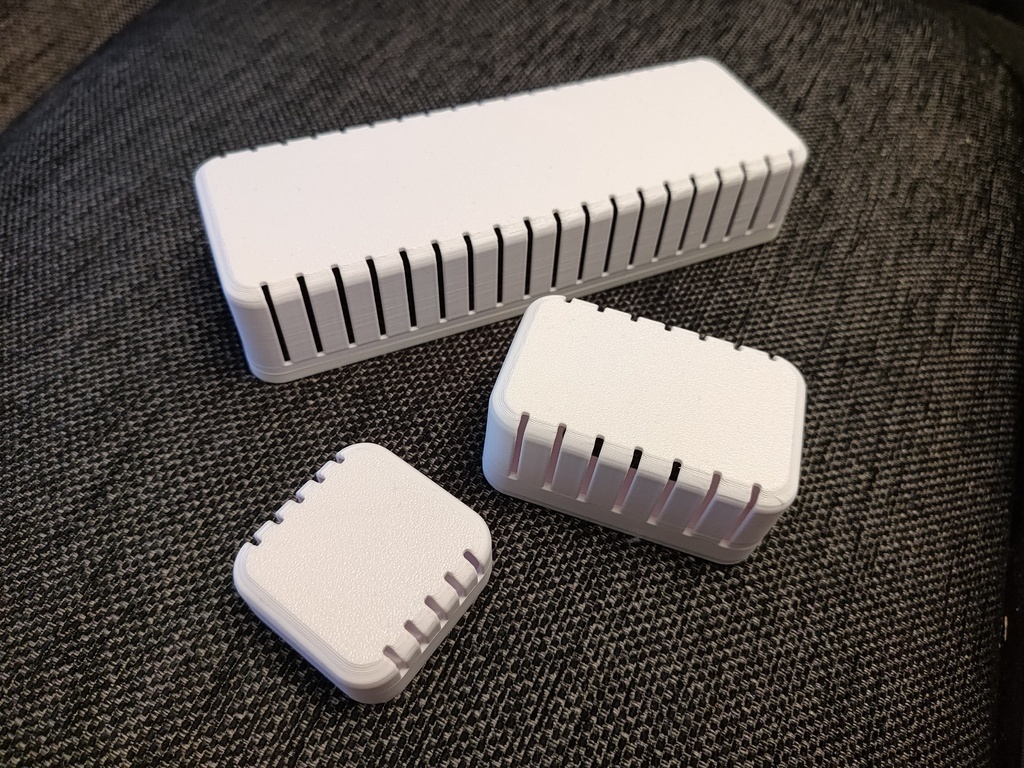 Free 3D file Multi-size wall-mounted snap-fit-lid vented box for wiring ...