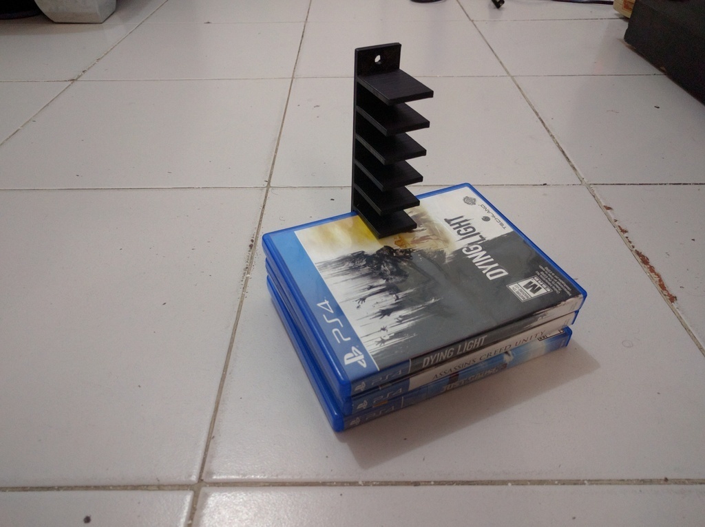Free 3D file PS4 - Blu Ray wall rack/hanger 🎮・3D print design to ...