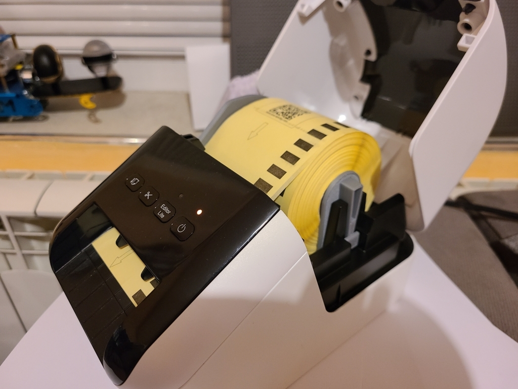 Free 3D file Brother QL-800 paper roll holder 🏠 ・3D printer model to ...